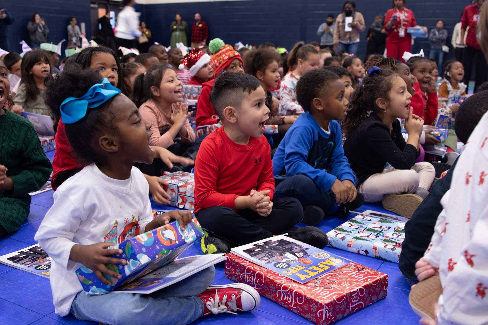 Santas in Uniform Come to Bryant Elementary School